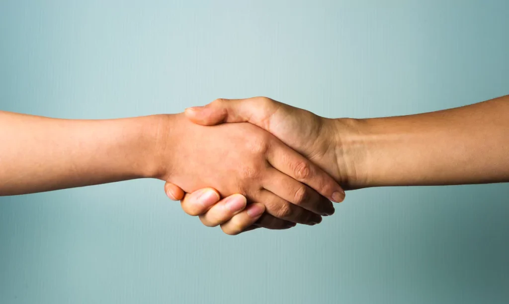 The Handshake Dilemma - Navigating Social Etiquette in a Germs Aware ...
